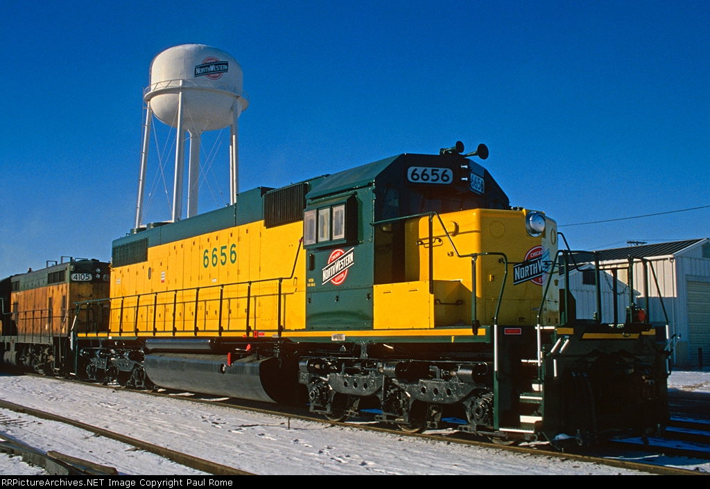 C&NW 6656, EMD SD38-2, posing at the water tower and wearing a fresh coat of paint at Proviso Yard